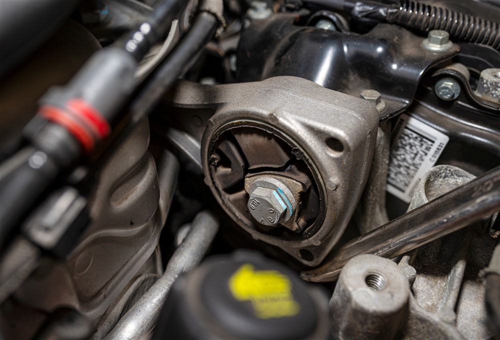 What do engine mounts do store